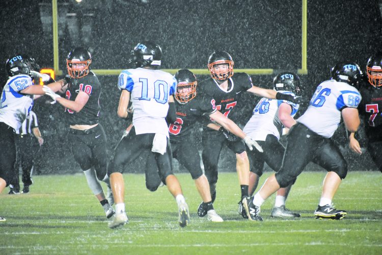 PREP FOOTBALL: Marshall cruises past TCU 35-0 in homecoming victory ...